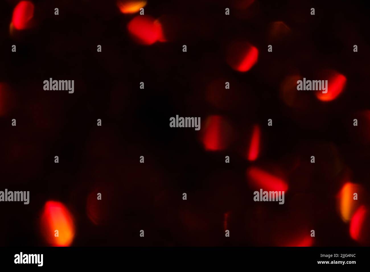 abstract lens flare background festive red blur Stock Photo - Alamy