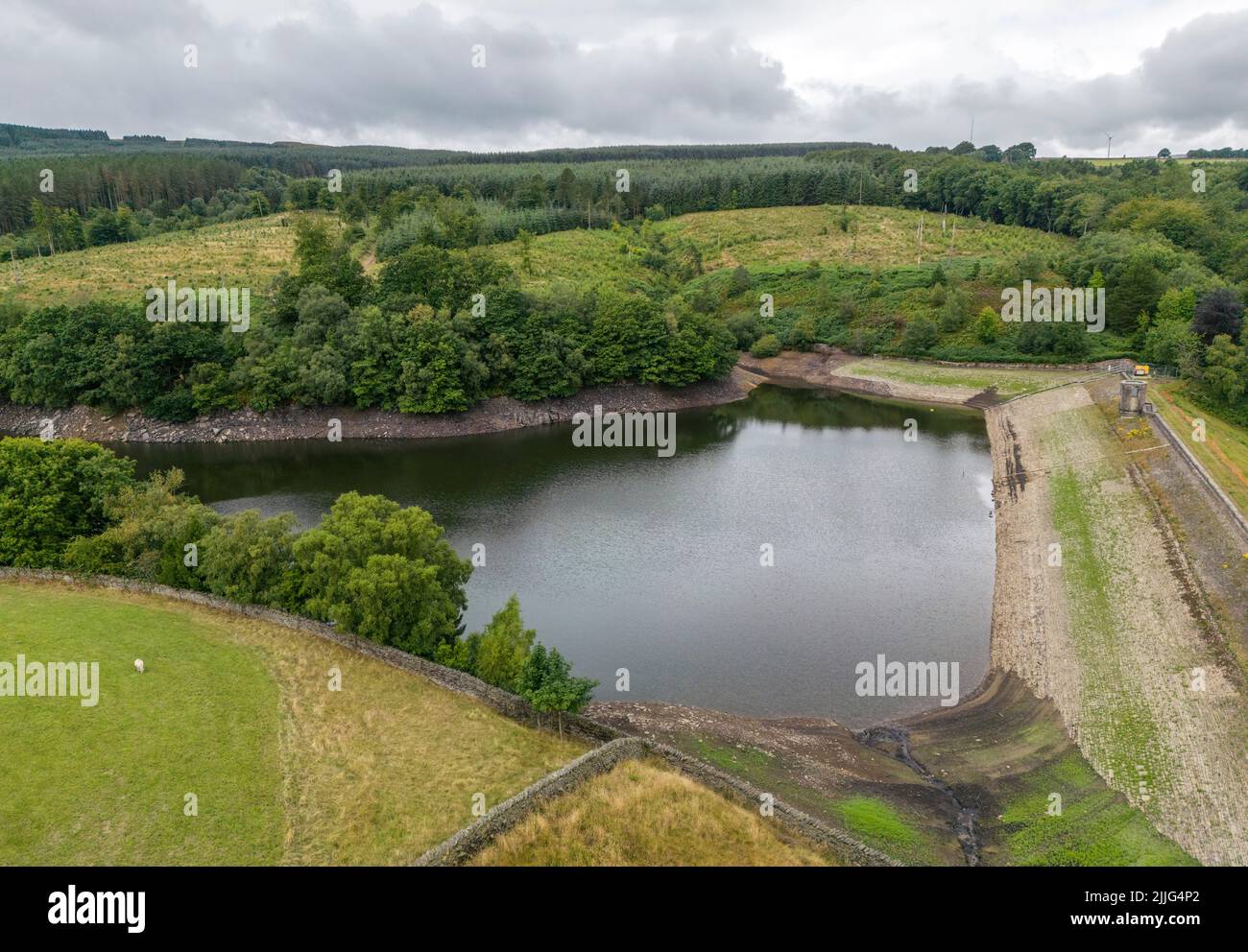 Low water levels at Holme Styes reservoir in Holmfirth West Yorkshire ...