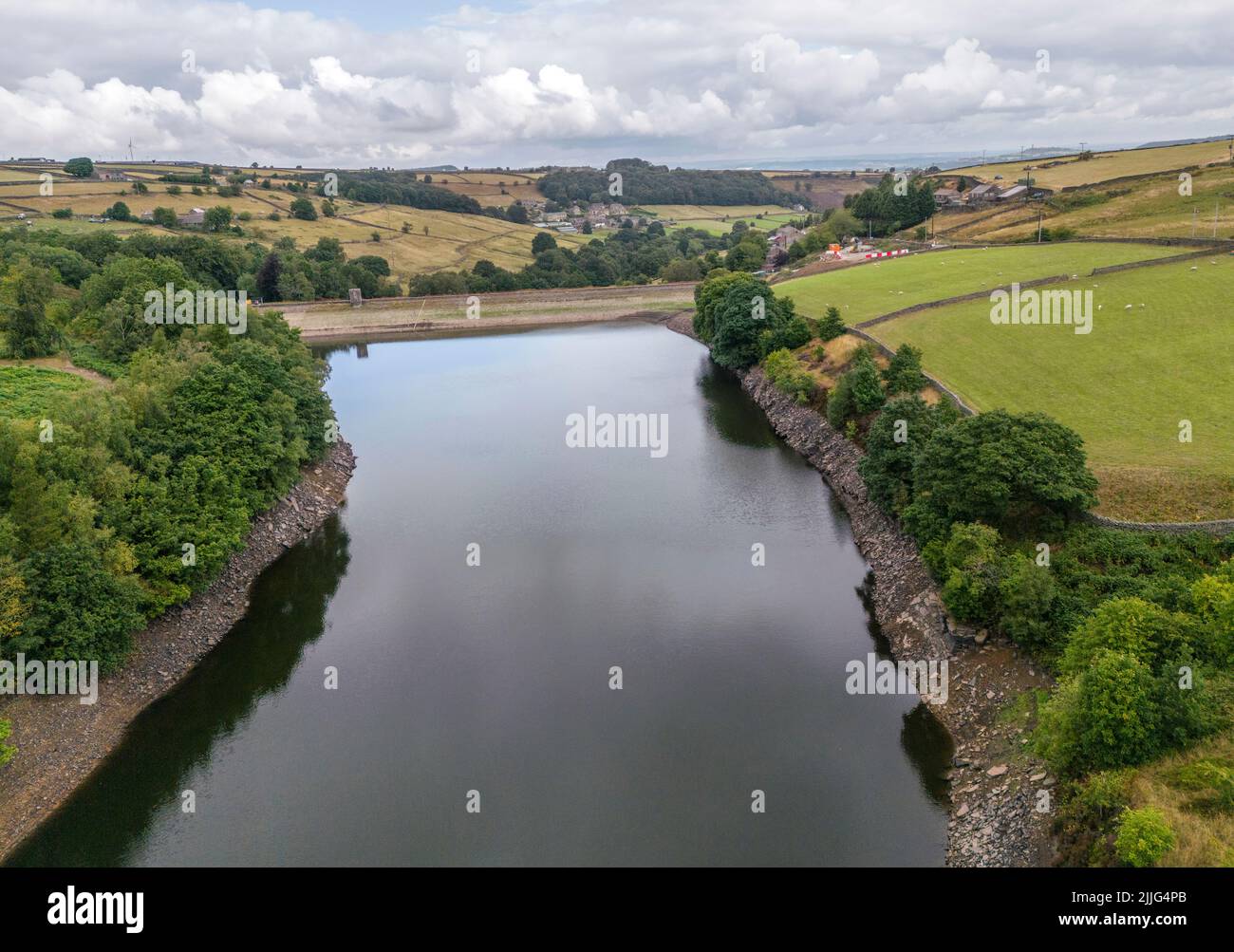 Low water levels at Holme Styes reservoir in Holmfirth West Yorkshire ...