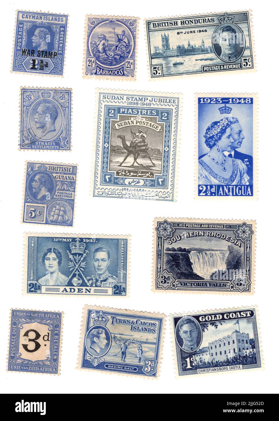 A selection of blue British Empire vintage postage stamps on a white ...