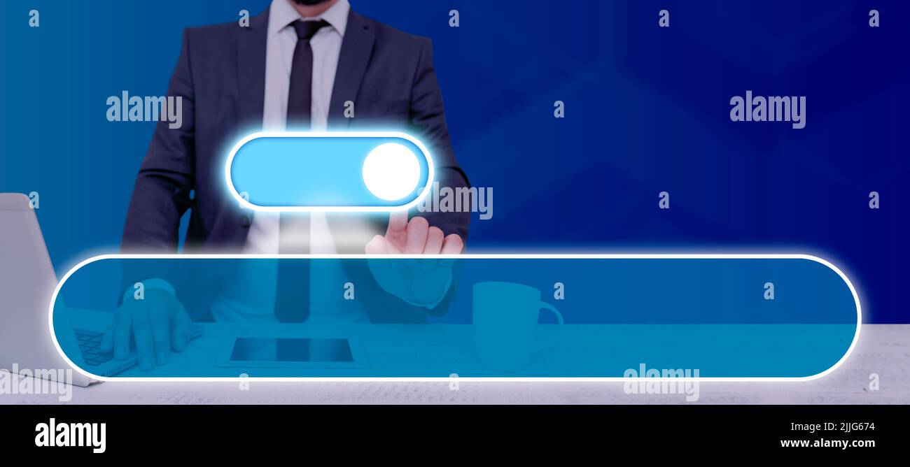 Businessman With A Latop And Tablet Pointing On The Power Button In A ...