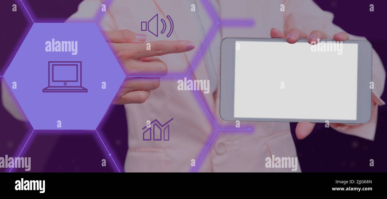 Businessman Pointing On A Tablet With Digital Symbols And Laptop In A ...