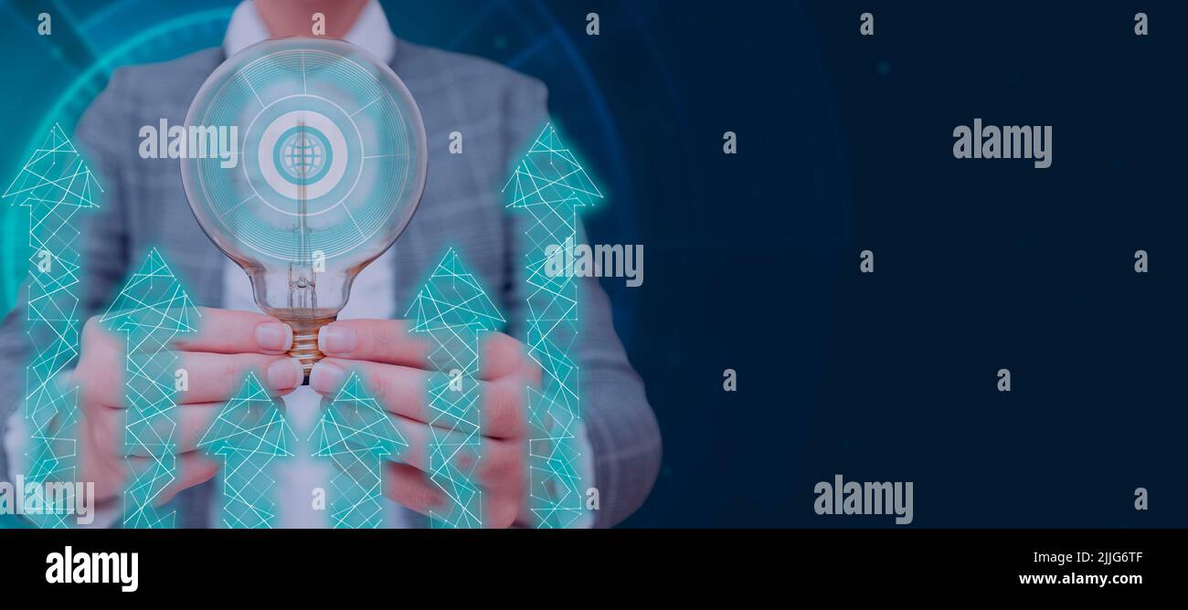 Businesswoman Holding A Light Bulb With Two Hands In A Creative Design ...