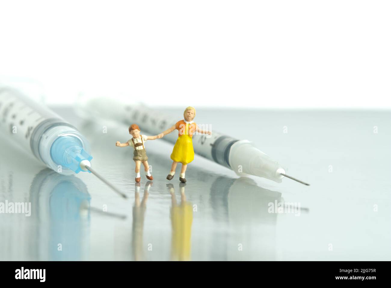 Miniature people toy figure photography. Vaccination for kids concept ...