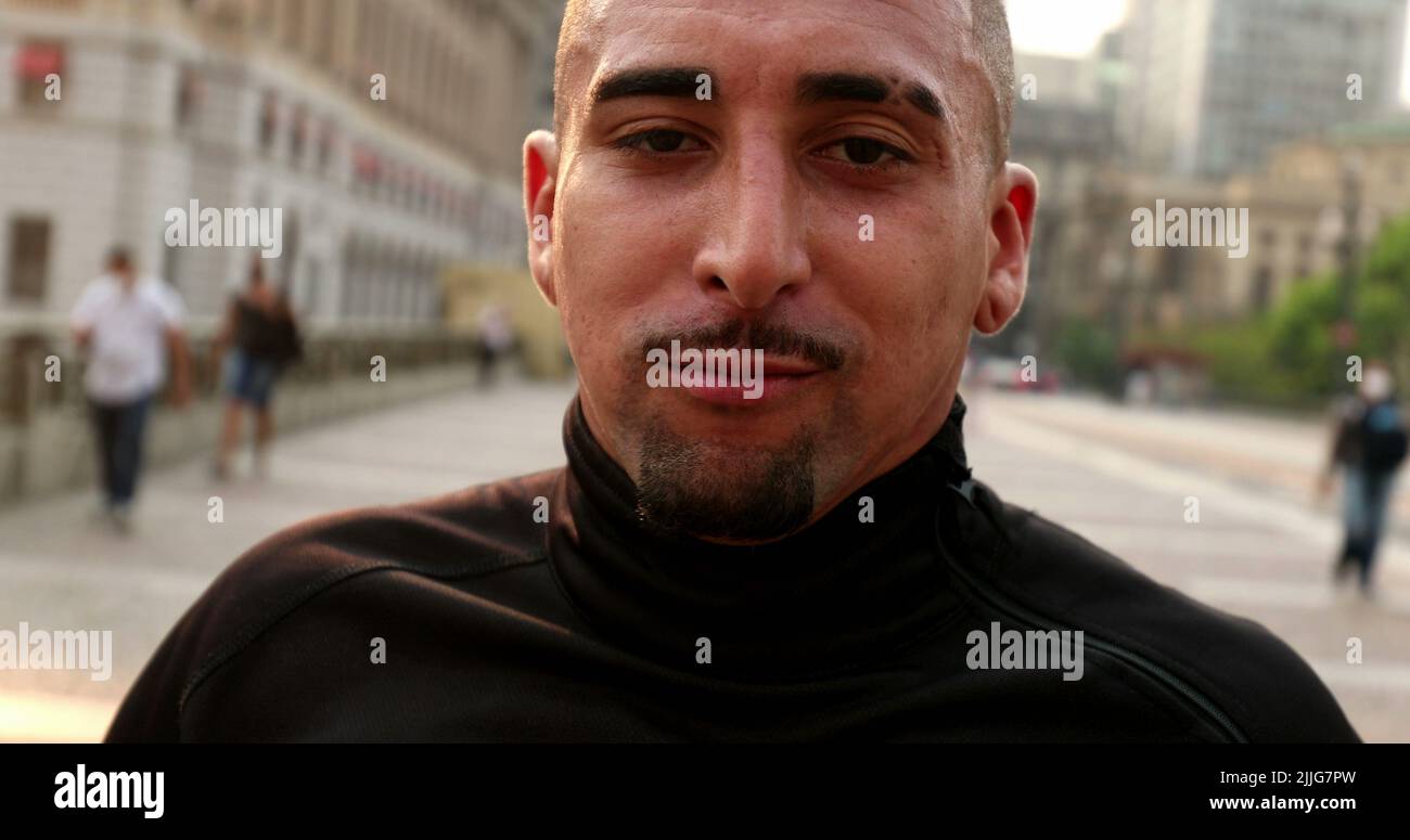 Urban dancer performing street dance with face only in city background ...