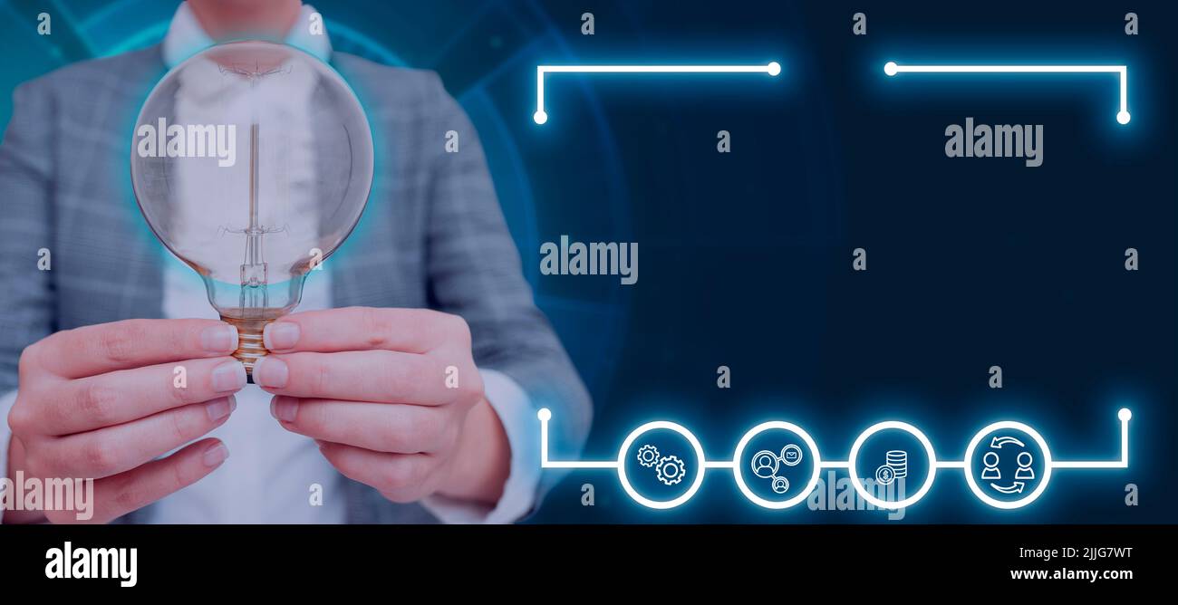 Businesswoman Holding With Two Hands A Light Bulb Image And Showing S ...