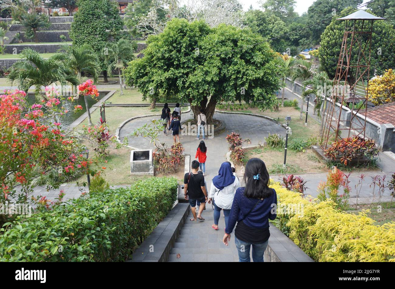 Tourists walk at Taman Narmada park in Lombok, Indonesia Stock Photo ...