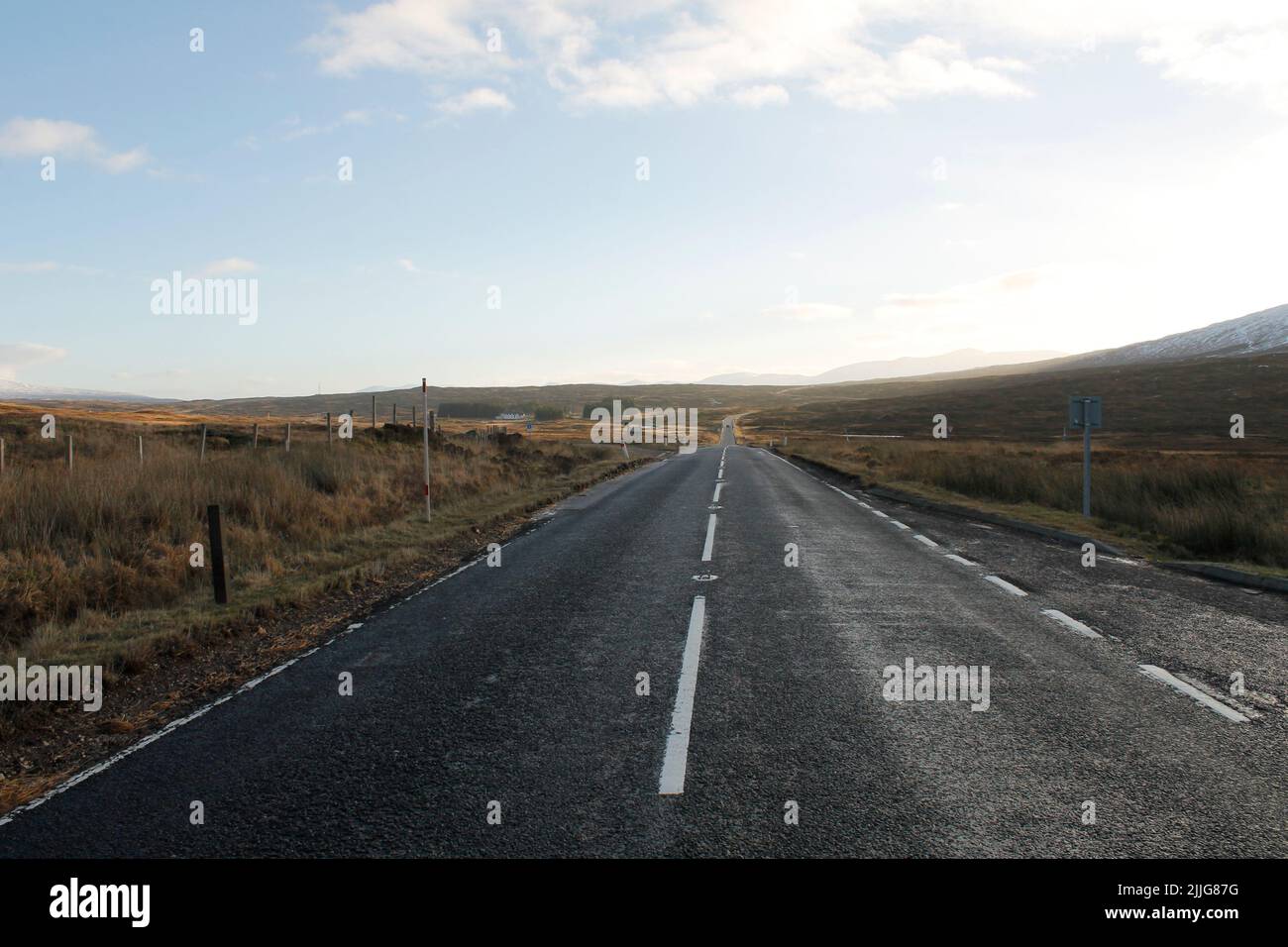 A paved road seemingly in the middle of nowhere in the Scottish ...