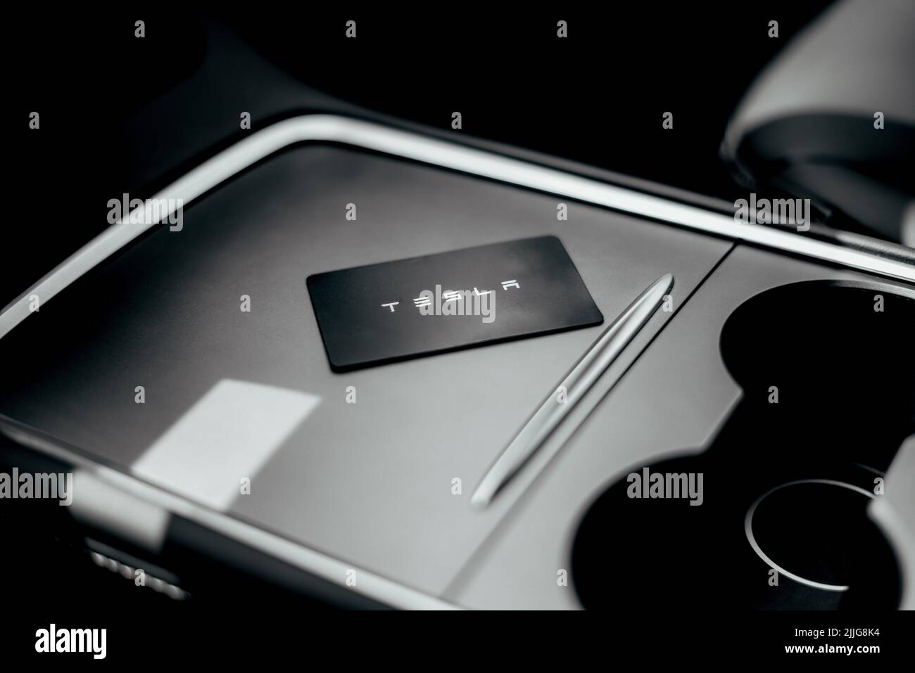 black key card with the inscription tesla from an electric car. russia ...