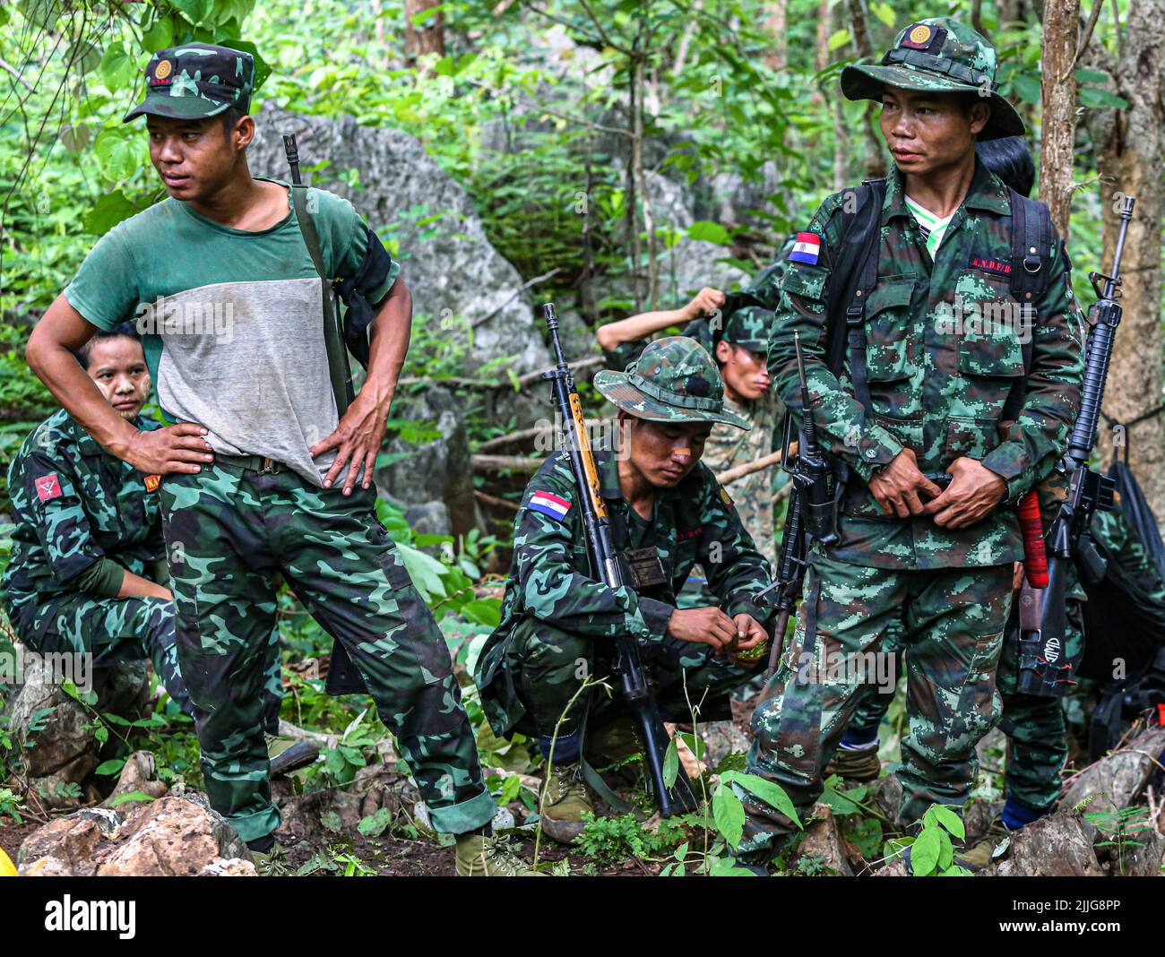 Karenni Nationalities Defence Force (KNDF) soldiers rest in a jungle. The Karenni Nationalities ...