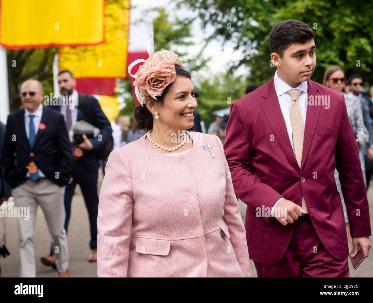 Home Secretary Priti Patel And Her Son Freddie Sawyer Aged 13 Arrive On Day One Of The Qatar