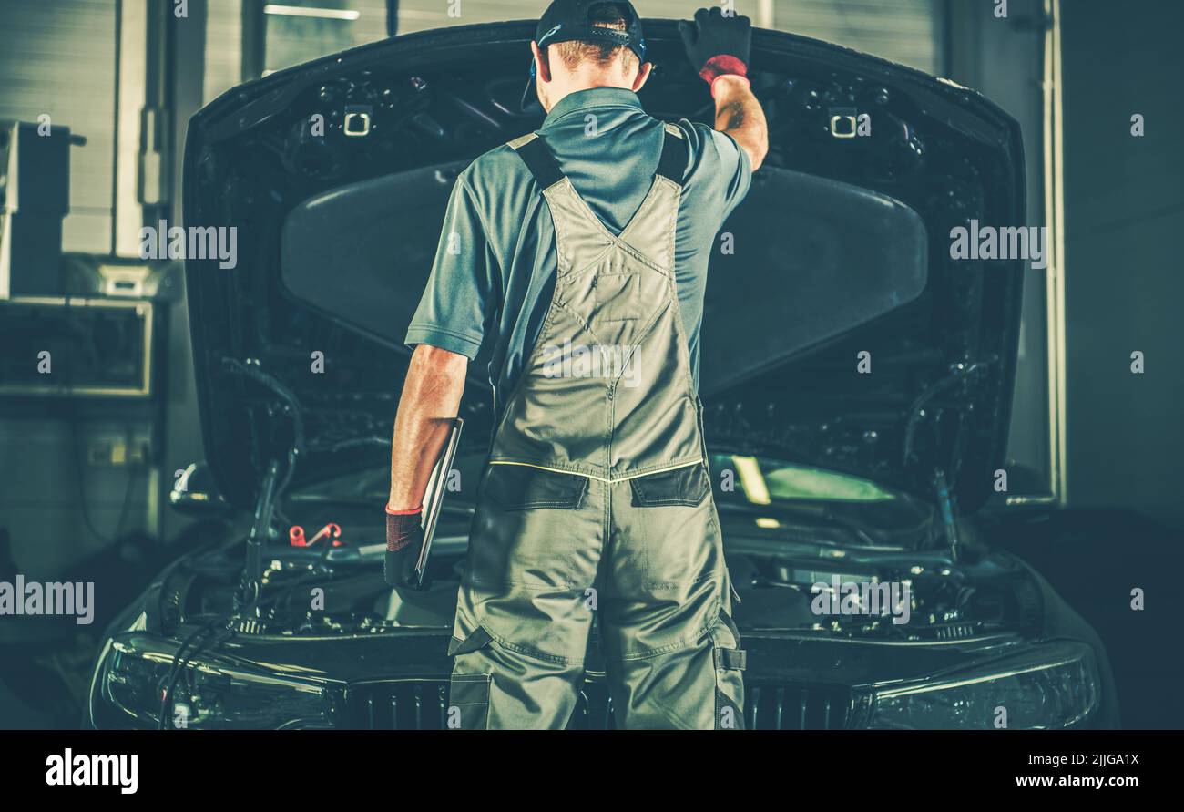 Professional Mechanic Taking the Last Look at the Sport Car Engine ...