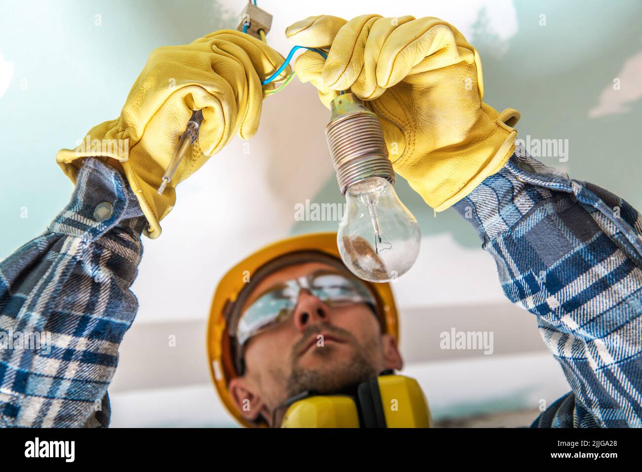 Closeup of a Focused Professional Electrician Checking the Correct ...
