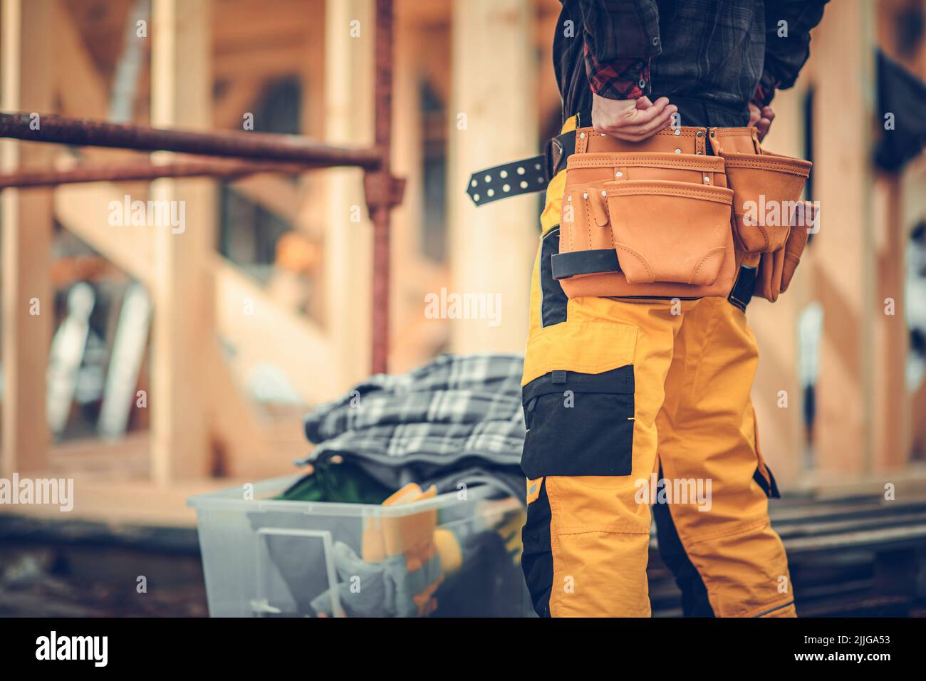 Closeup of a Contractor Fastening His Leather Tool Belt Preparing to ...