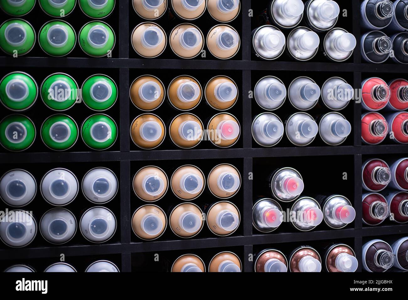 variety of color spray cans with paint. Spray cans of graffiti paints ...