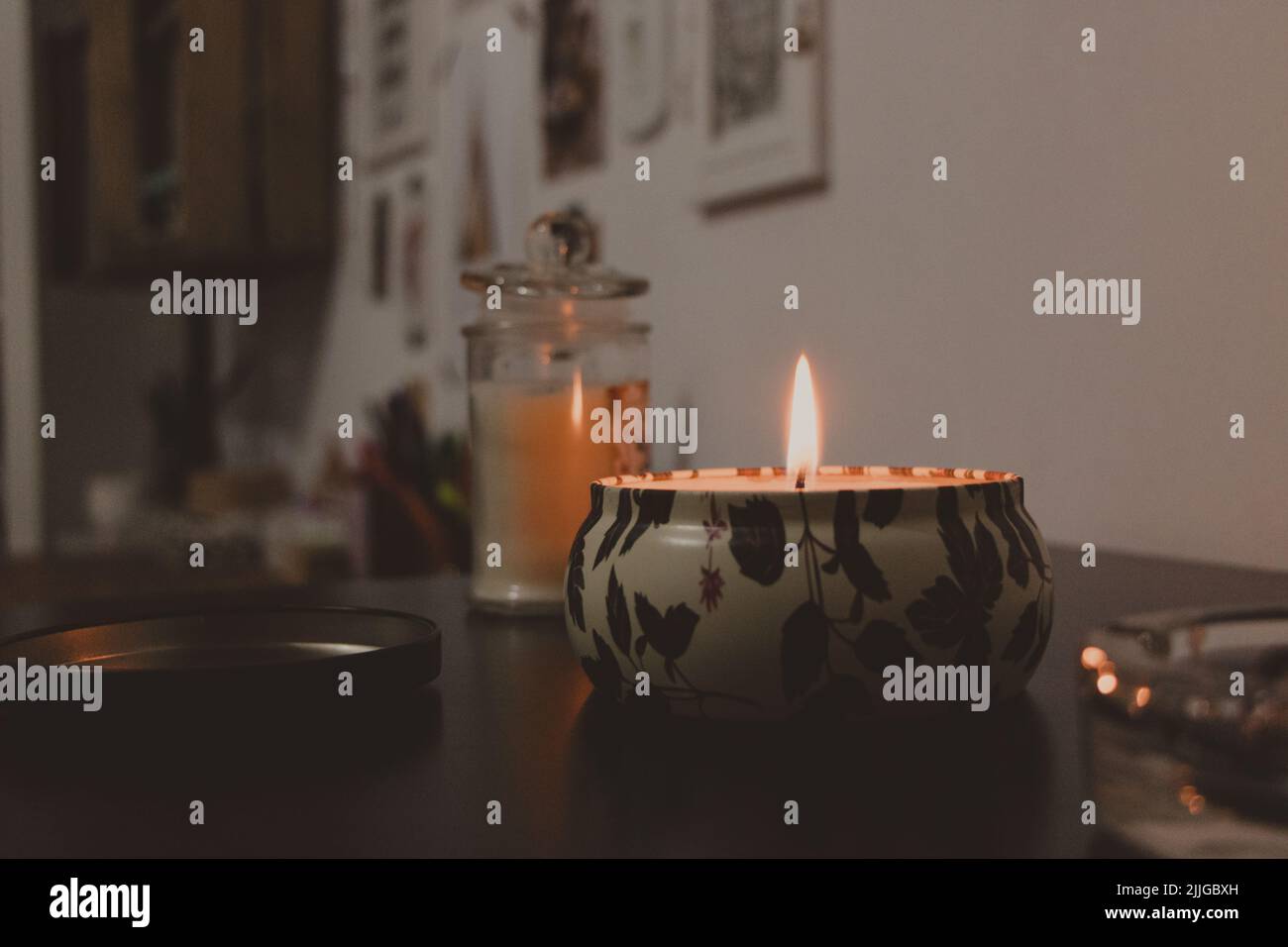 Cozy candle light glowing in hi-res stock photography and images - Alamy