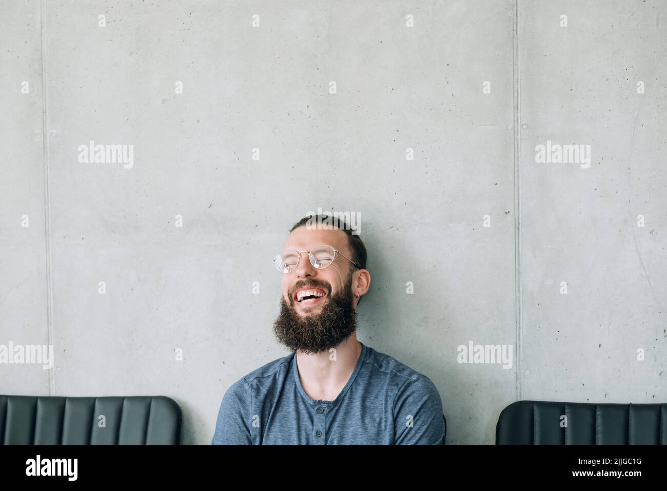 happy laughing bearded man emotion expression Stock Photo - Alamy