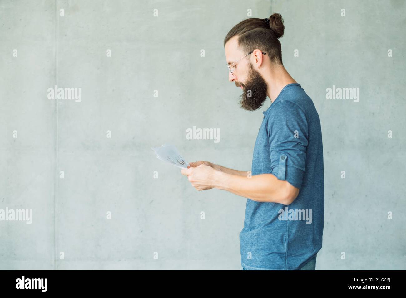 focused man read business documents information Stock Photo - Alamy