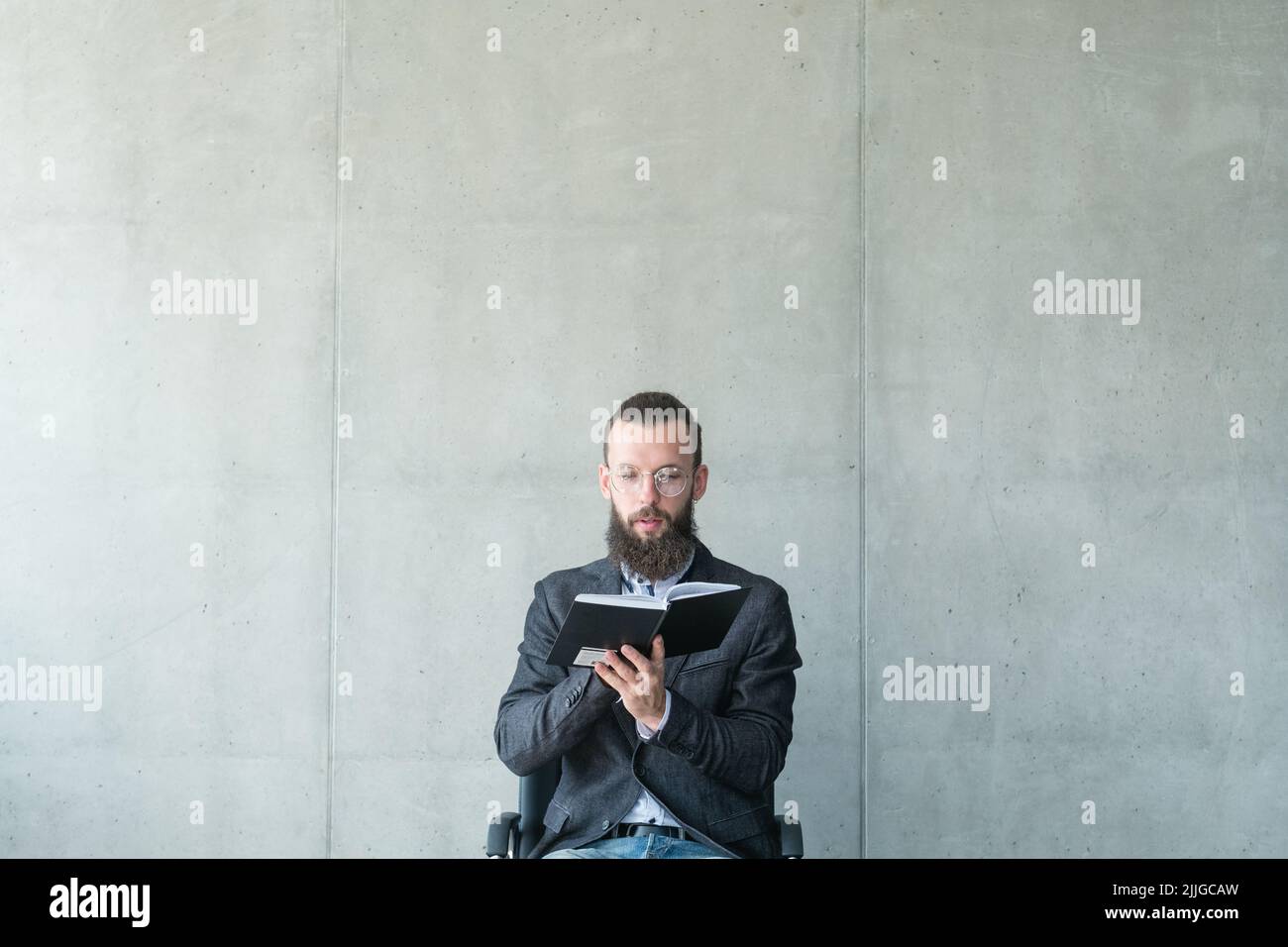 man read planner information knowledge learning Stock Photo - Alamy