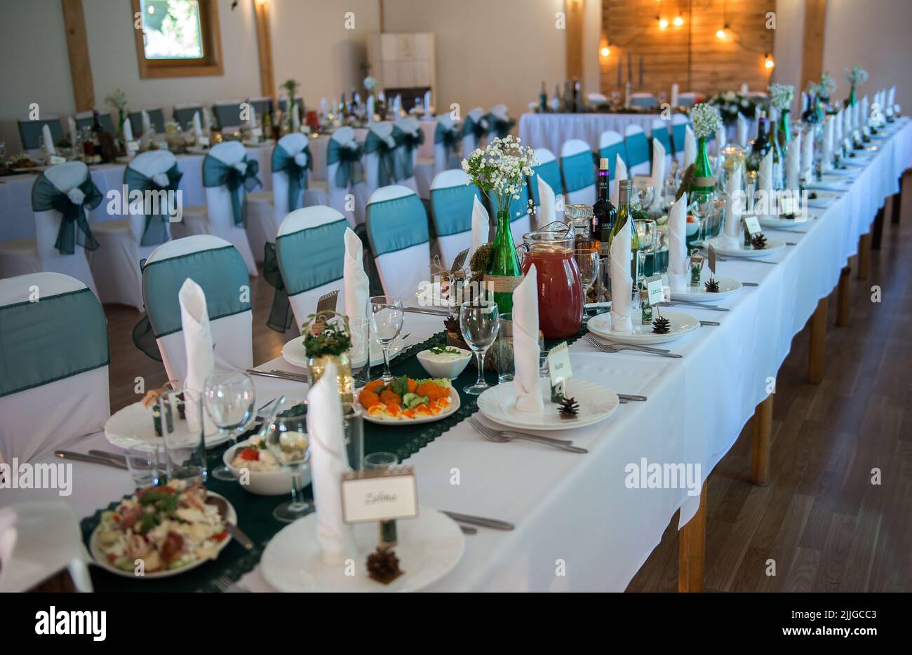 A high angle shot of an organized wedding venue dinner table Stock ...