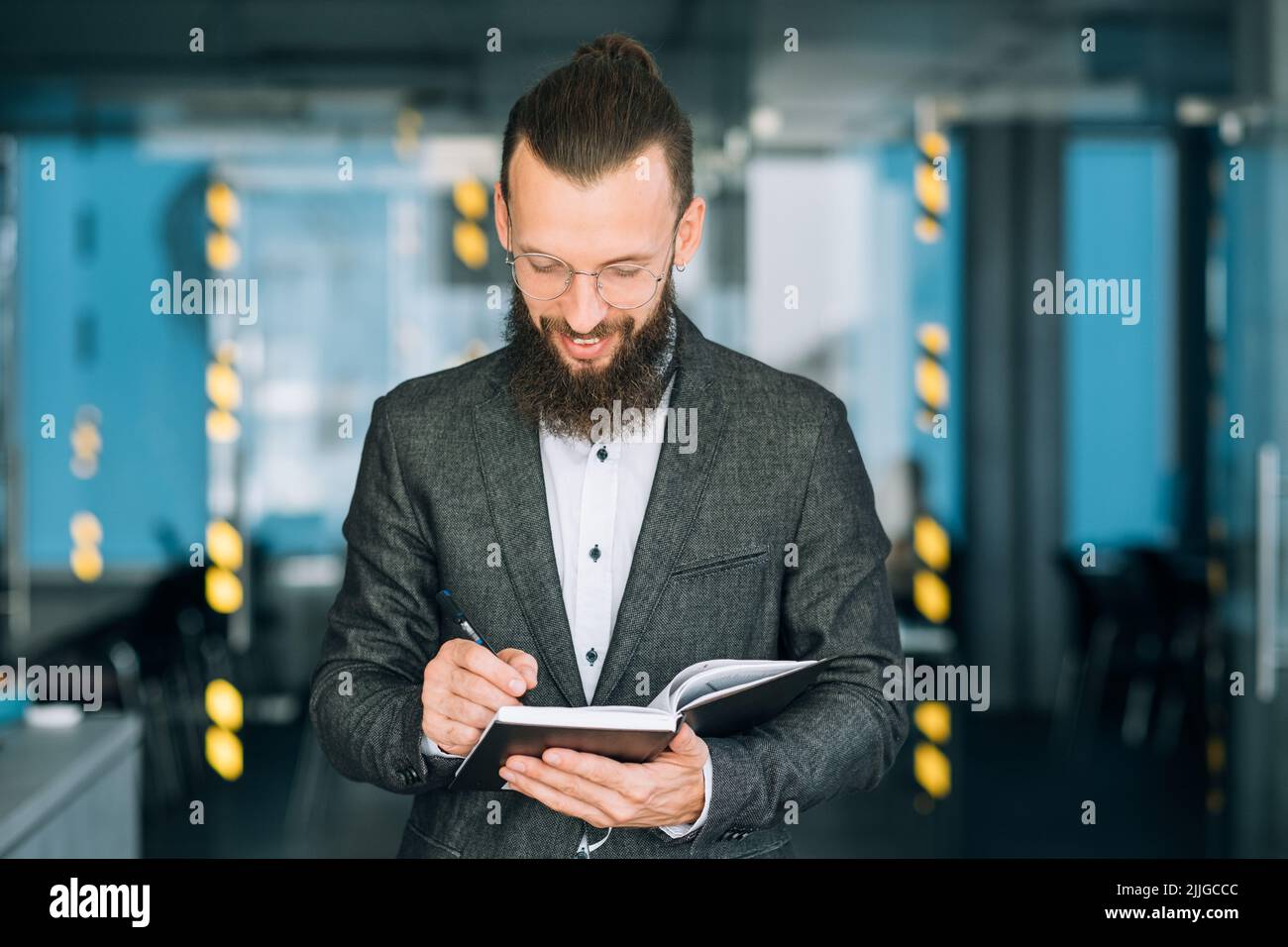 man writing notebook business agenda timetable Stock Photo - Alamy
