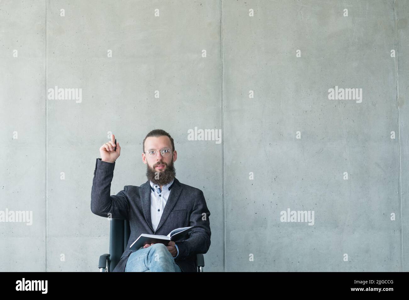 man point up business seminar corporate education Stock Photo - Alamy