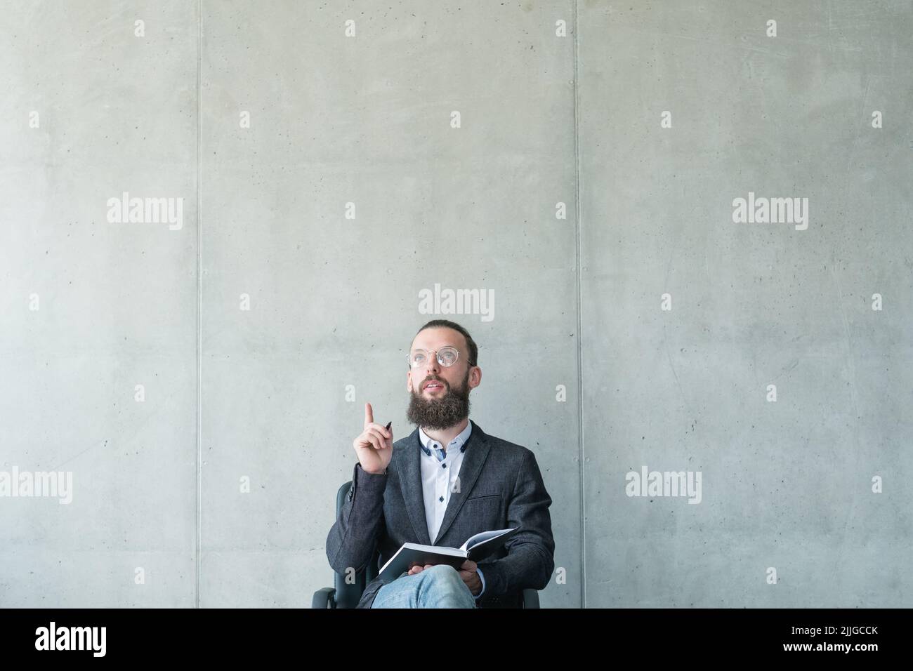 man point up business seminar corporate education Stock Photo - Alamy