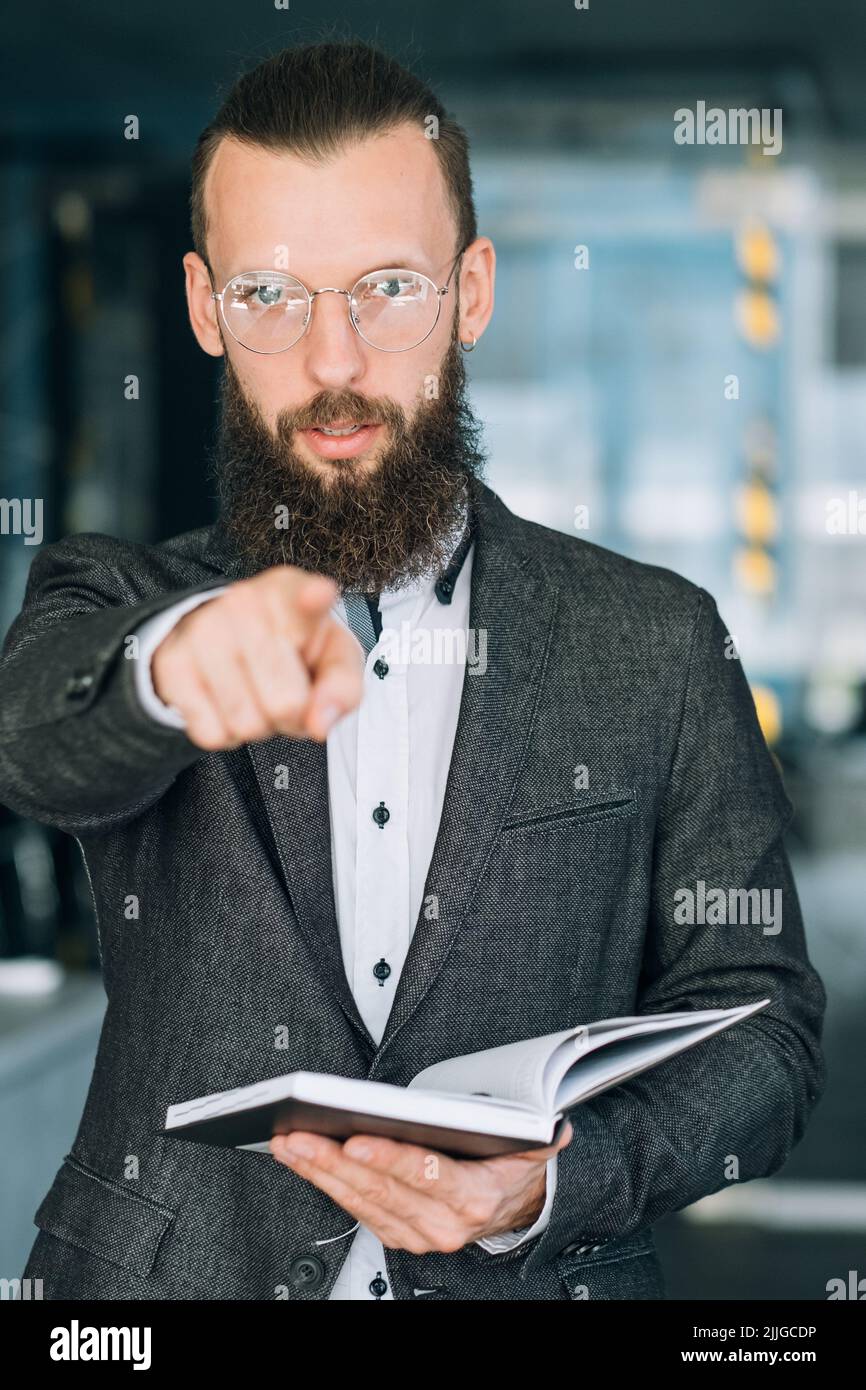 career training business coach man pointing finger Stock Photo - Alamy