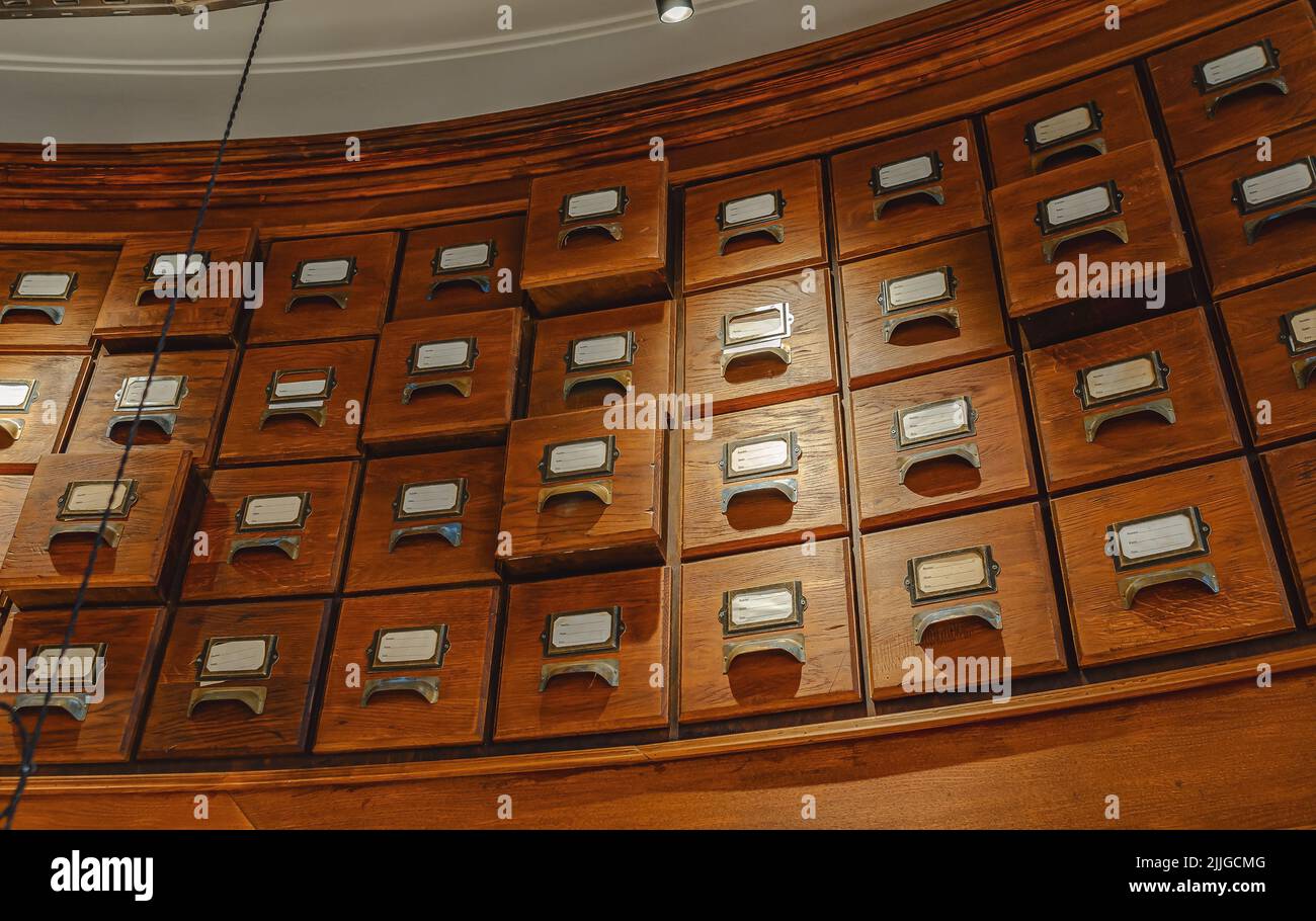 Wooden drawers in vintage filing cabinet Stock Photo - Alamy