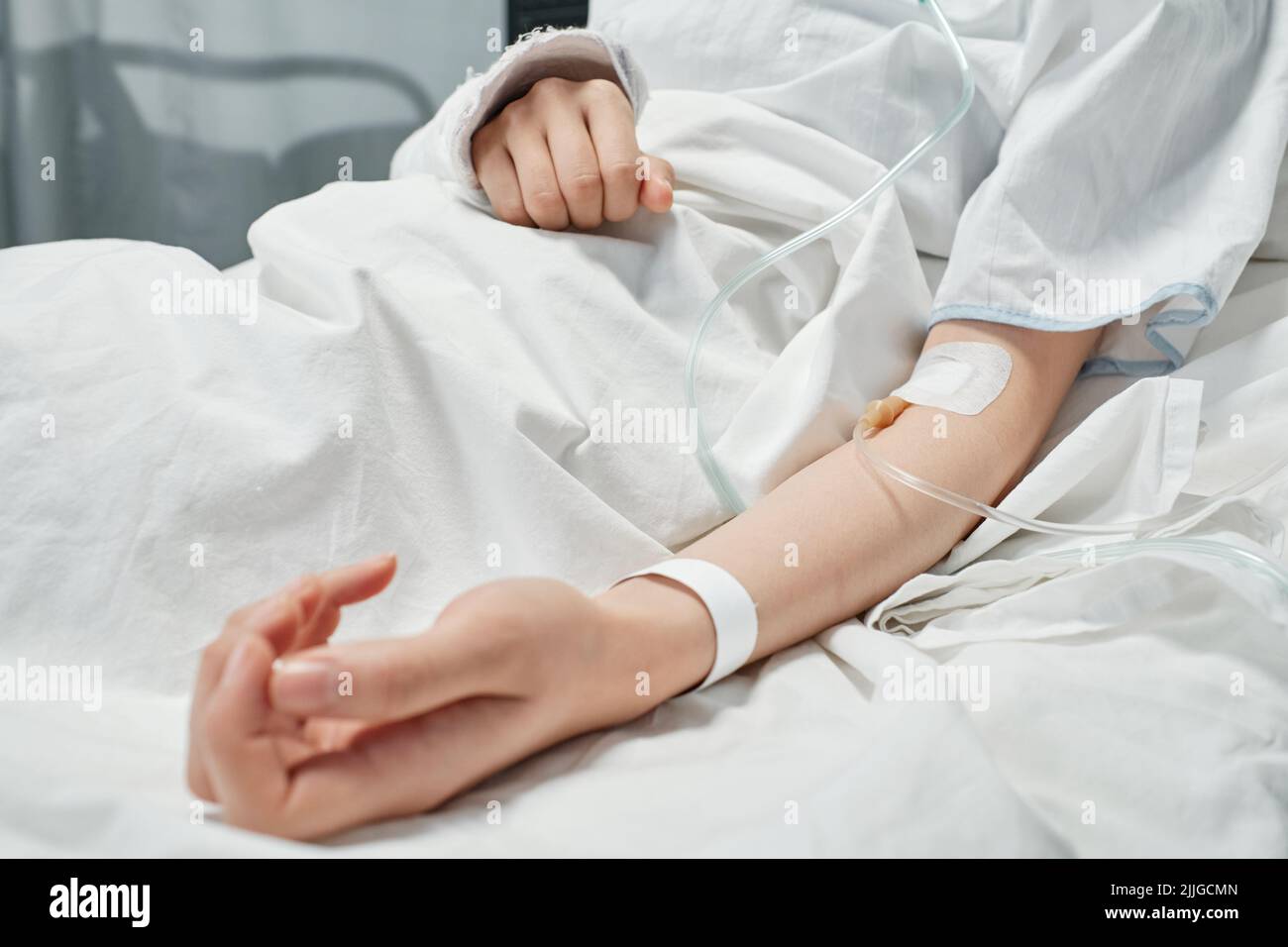 Horizontal shot of unrecognizable female patient receiving medication ...