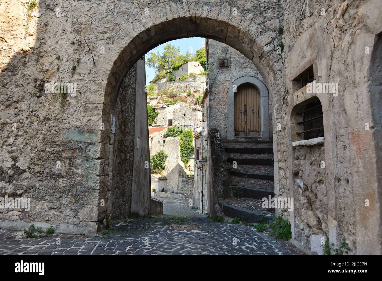 A narrow street in Pesche, a mountain village in the Molise region of ...