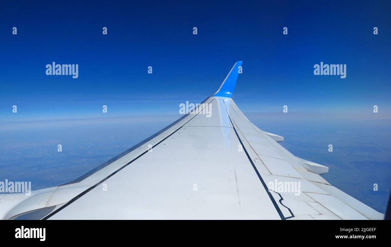 The close-up of the airplane wing in the air Stock Photo - Alamy