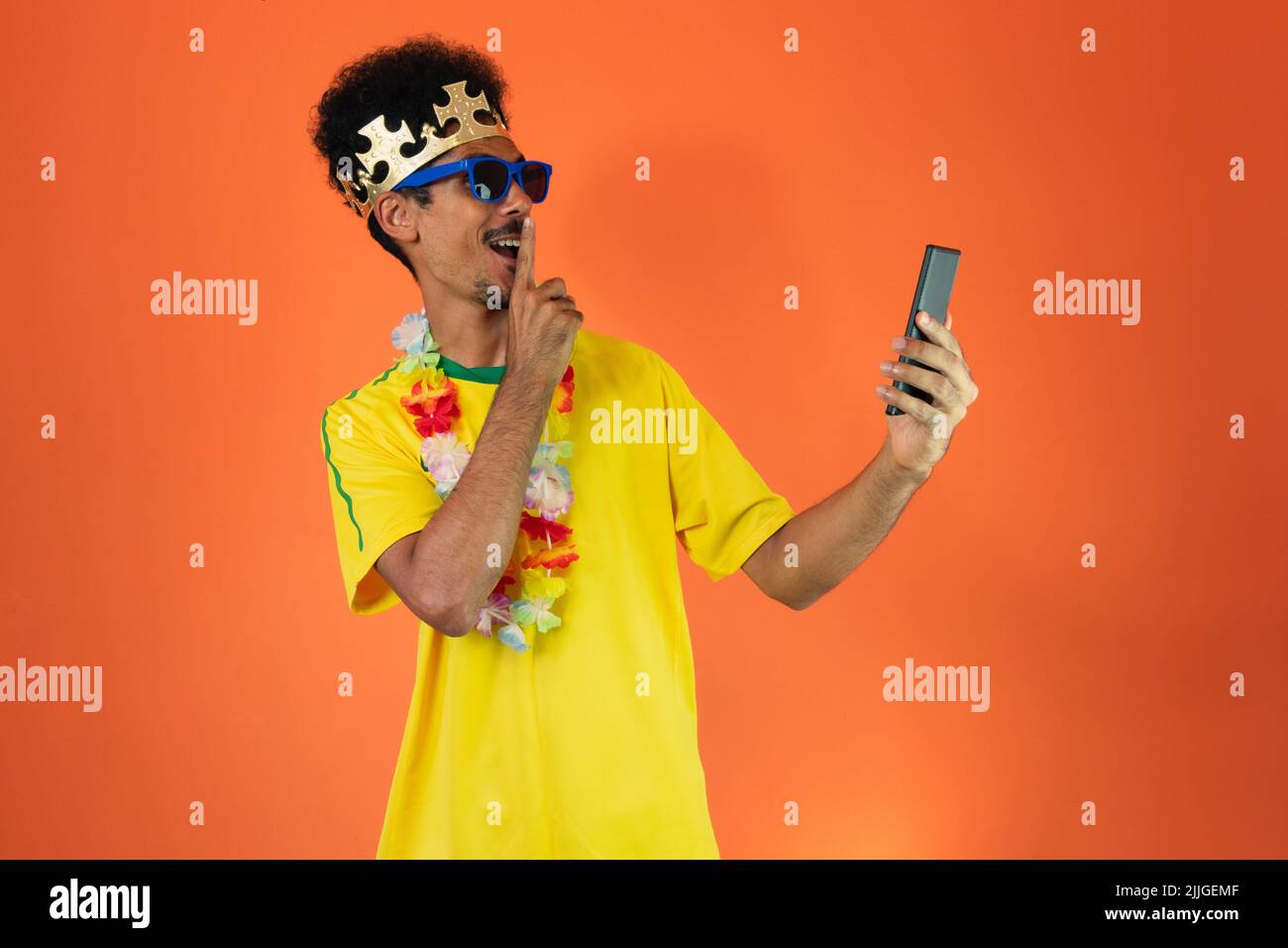 Black man football fan isolated Stock Photo - Alamy