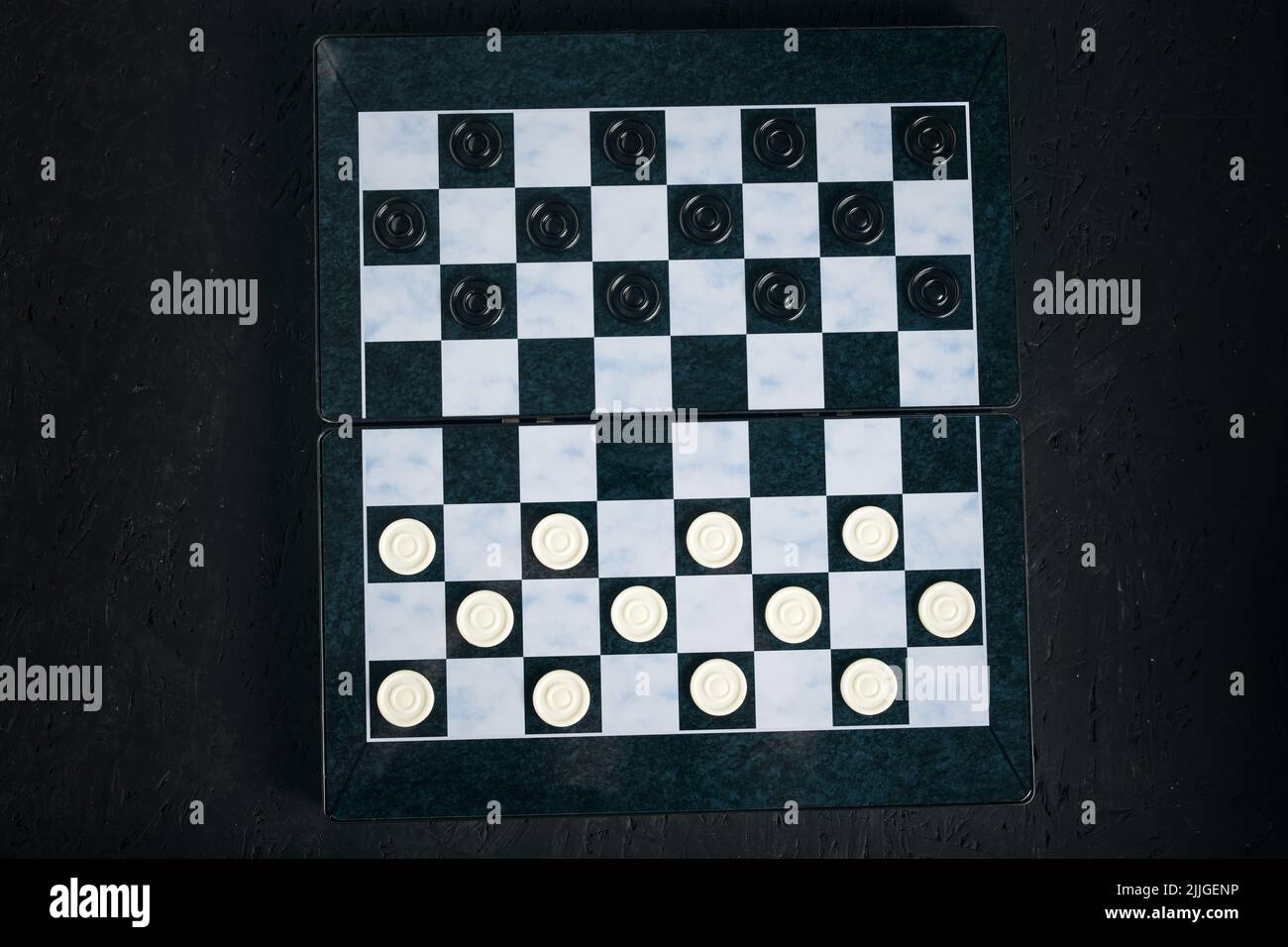 Checkers board with chips black background, checkers logical board game ...