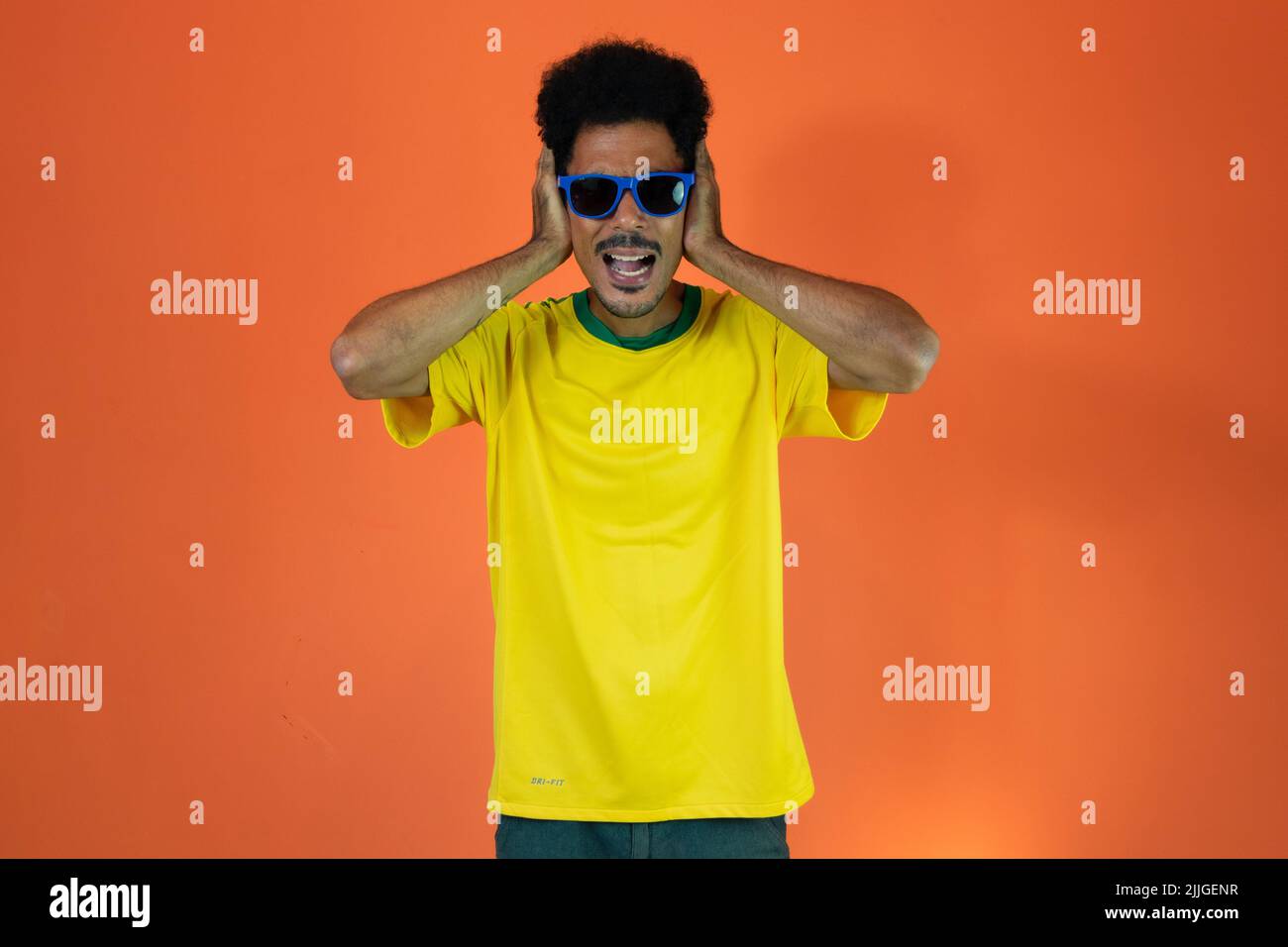Black man football fan isolated Stock Photo - Alamy