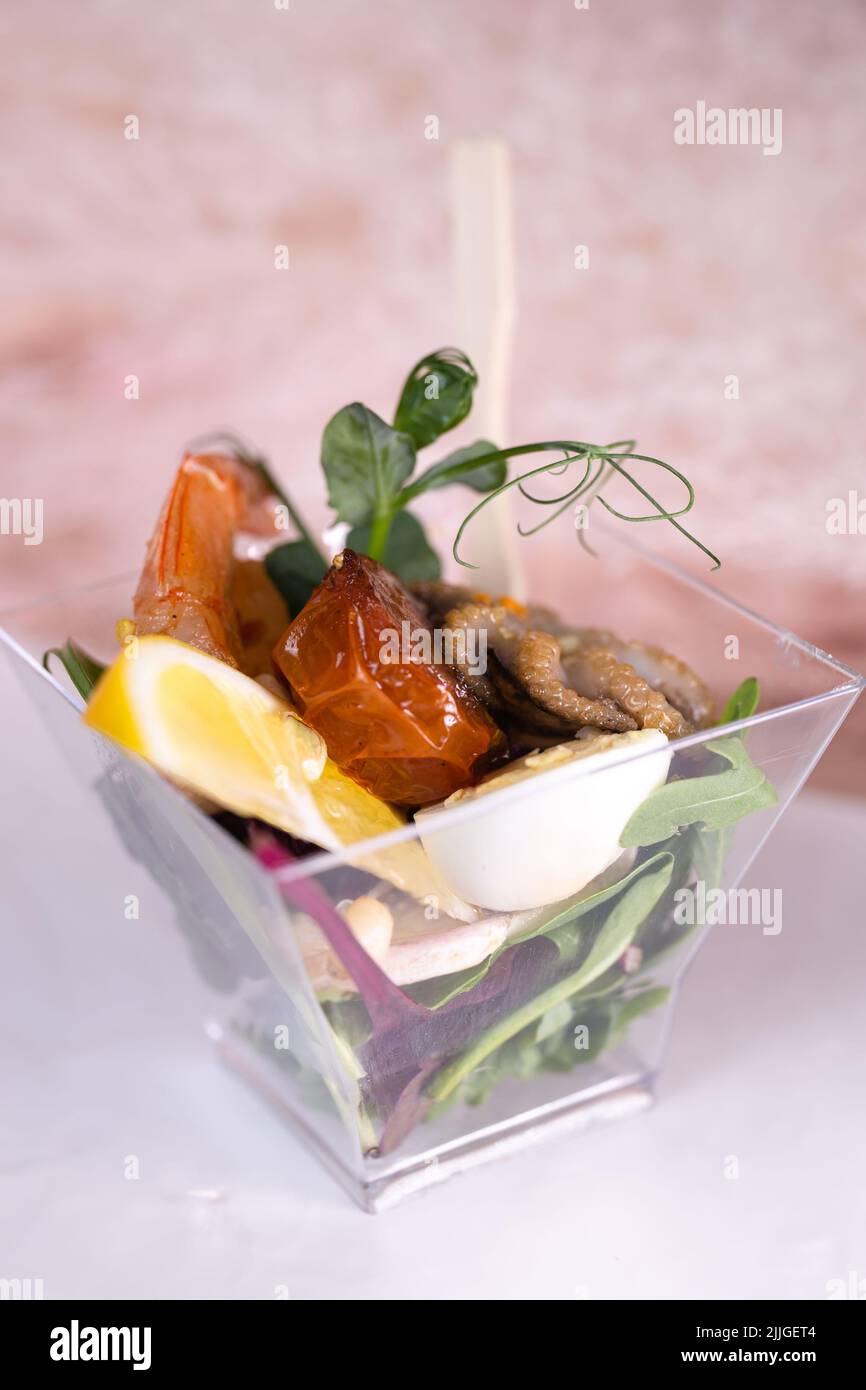 snack in a plastic cup close-up. appetizer on the buffet table Stock ...