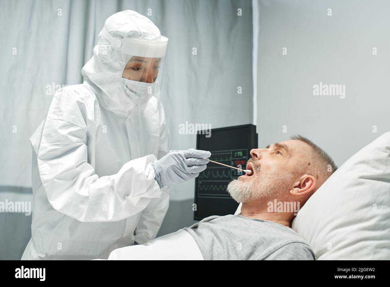 Hospital patient in bed infectious hi-res stock photography and images ...