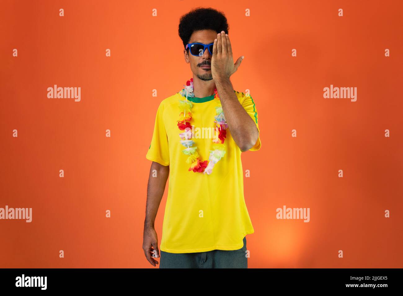 Black man football fan isolated Stock Photo - Alamy