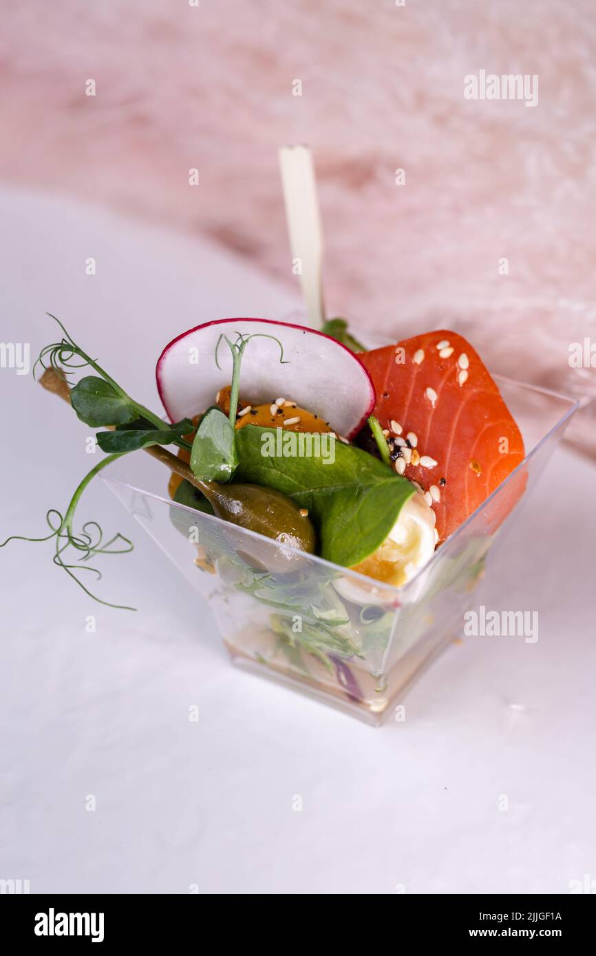 snack in a plastic cup close-up. appetizer on the buffet table Stock ...