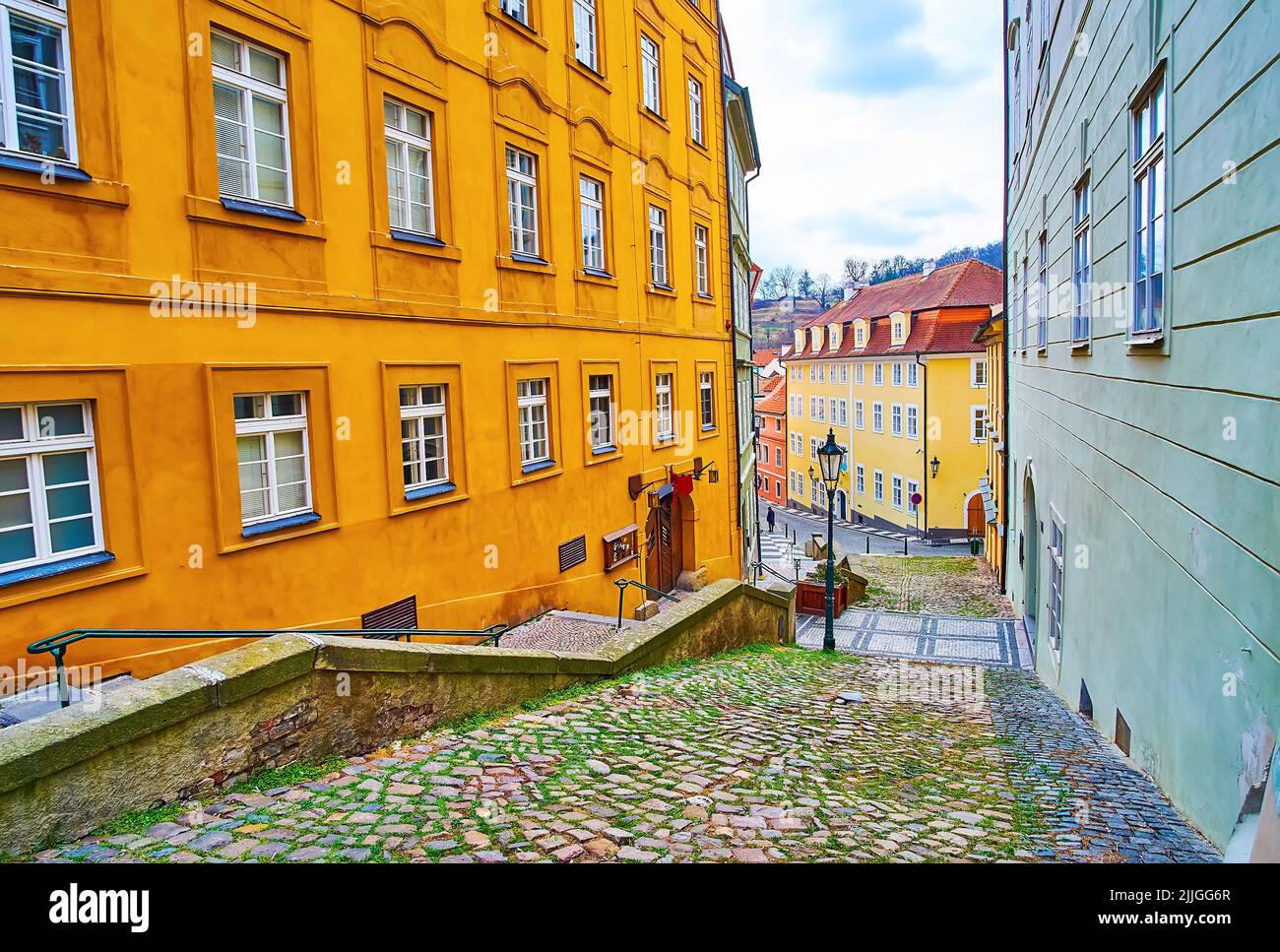The narrow descent of historic Jansky Vrsek Street in Lesser Quarter ...