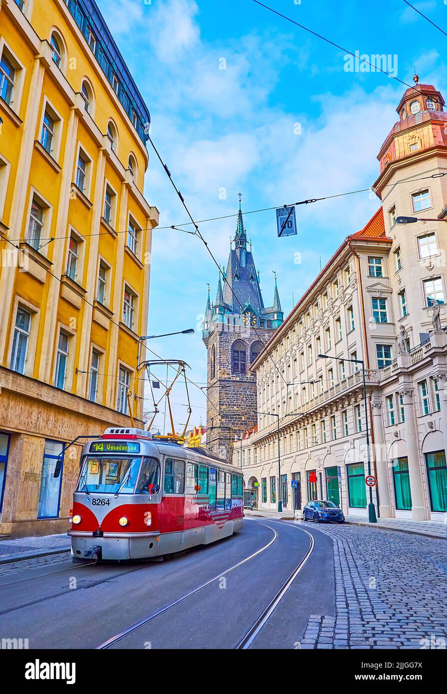 The scenic red vintage tram rides in front of the medieval Henry's ...