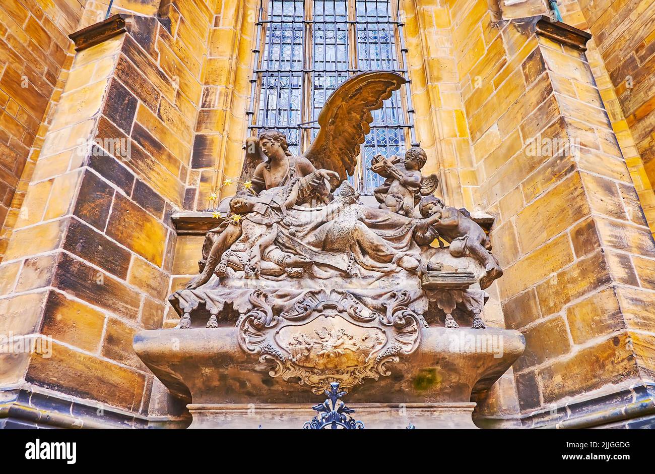 The old stone Cenotaph with sculpture of St John Nepomuk and angels ...