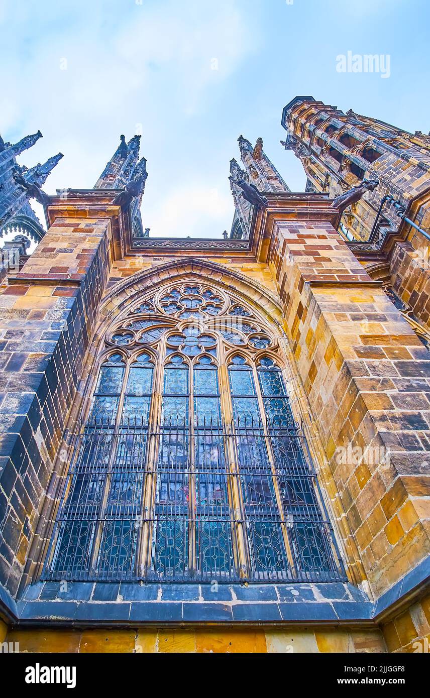 The Gothic arched window of St Vitus Cathedral, decorated with stained ...