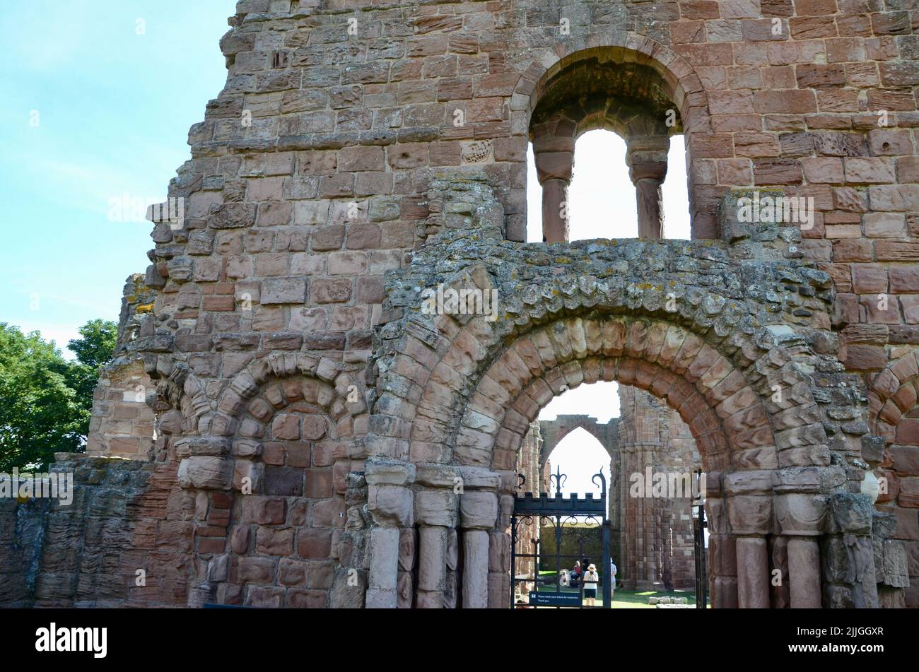 holy island lindisfarne priory castle monastry graveyard boat huts and ...