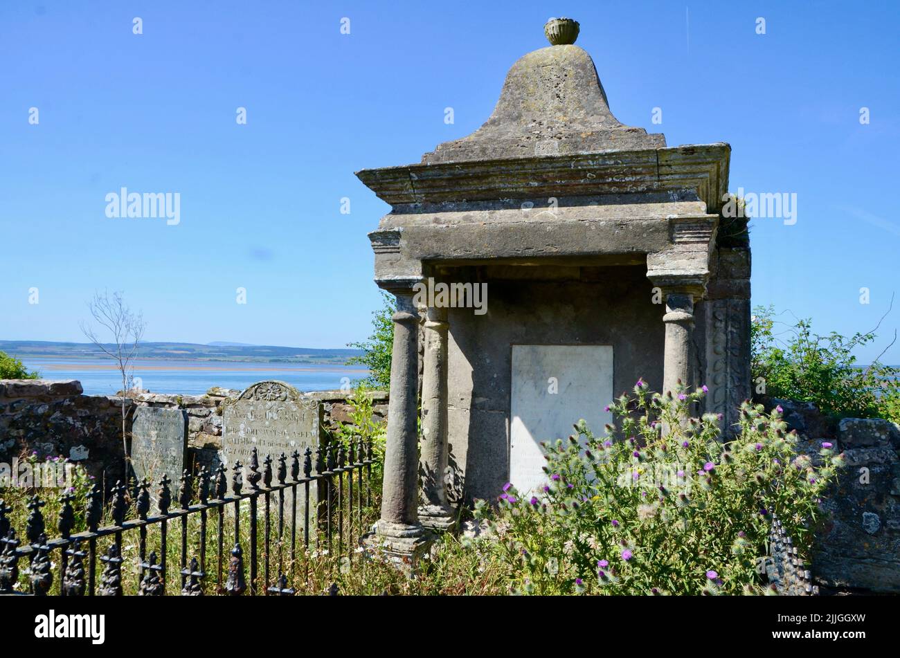 holy island lindisfarne priory castle monastry graveyard boat huts and ...