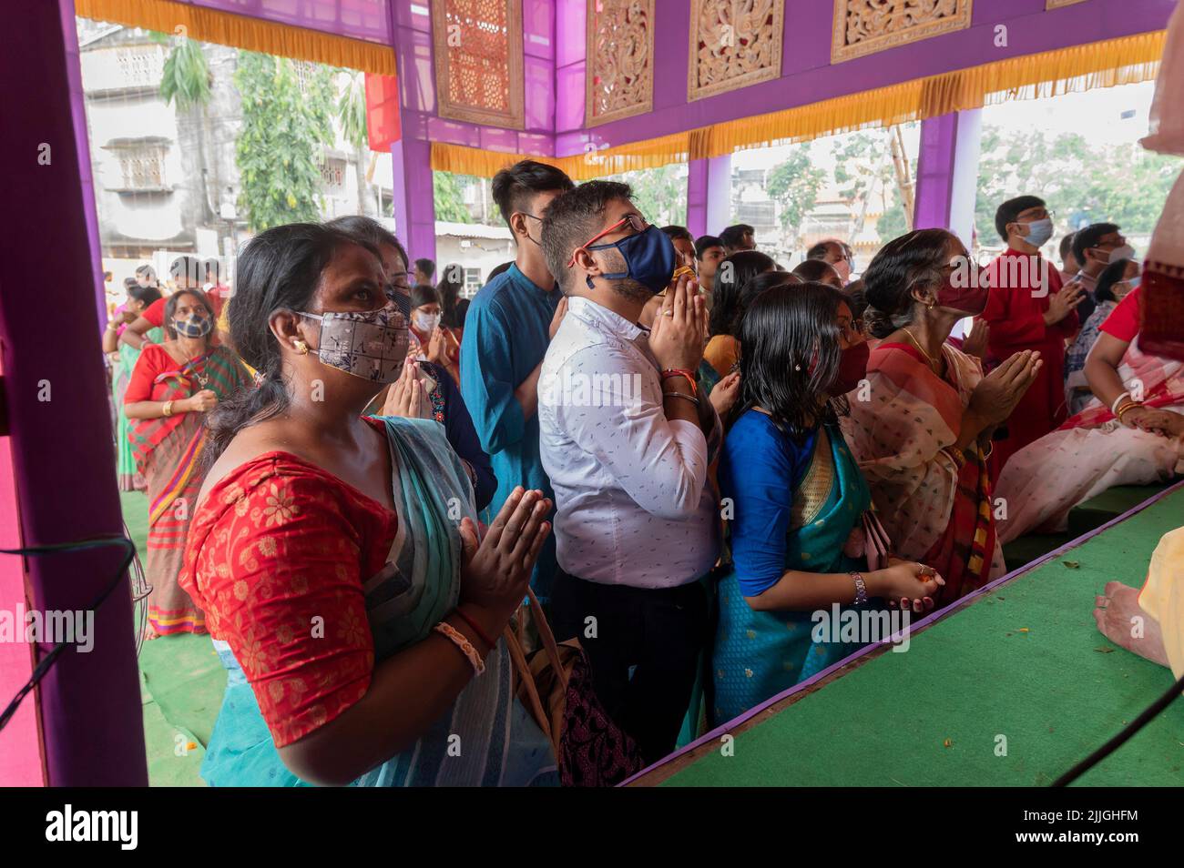 Howrah, West Bengal, India - 14th October 2021 : Hindu devotees offering pushpanjali to Goddess ...
