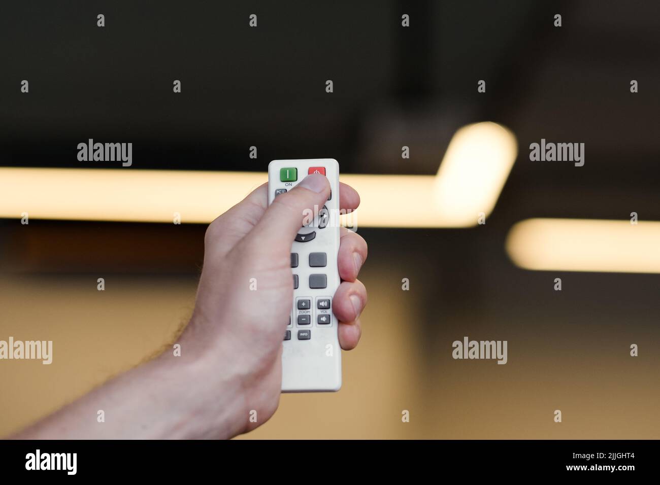 wireless digital appliance remote control man Stock Photo - Alamy