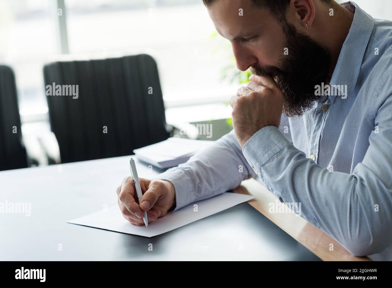 corporate life paperwork concerned business man Stock Photo - Alamy