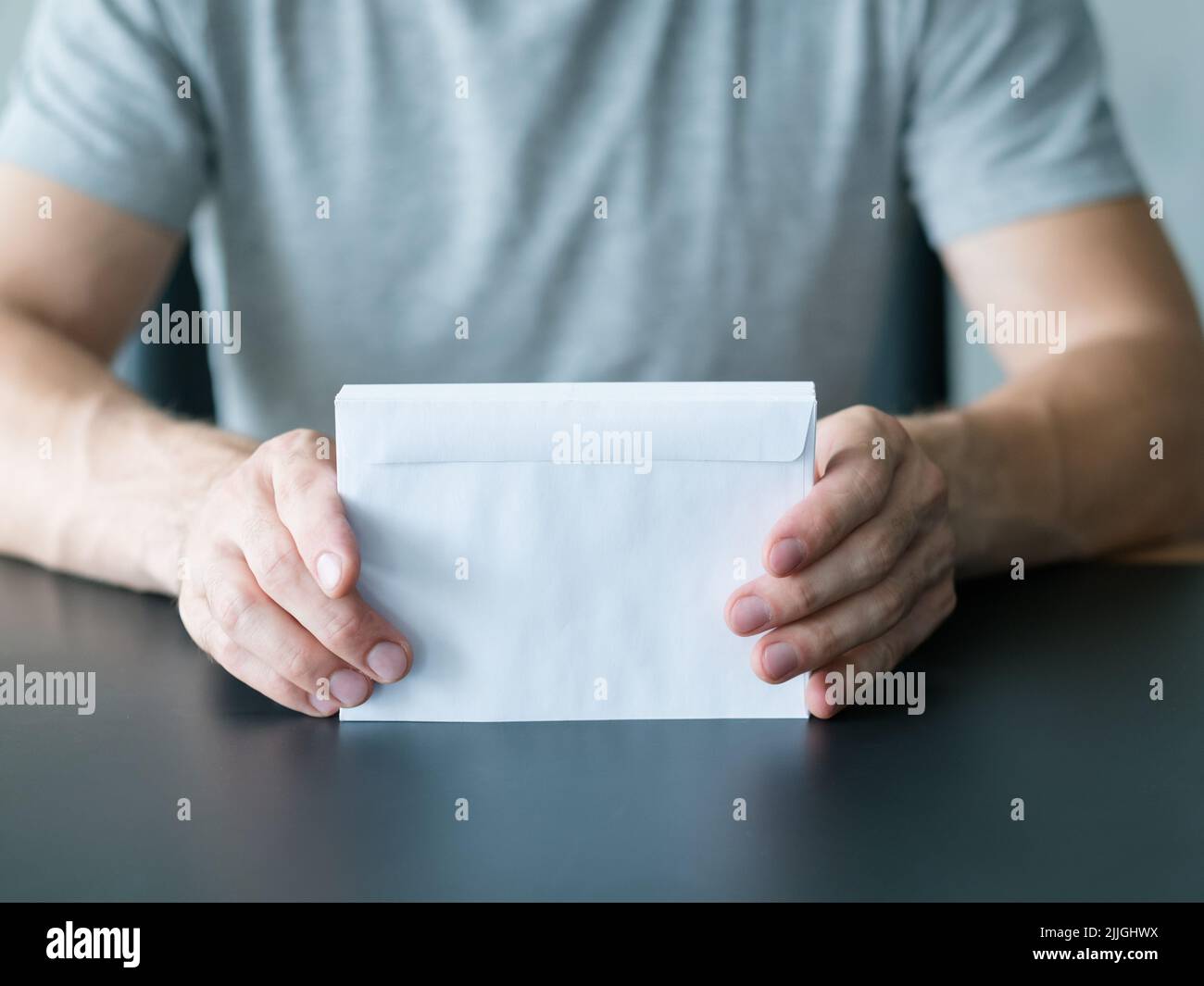invitation letter man stack white envelopes Stock Photo - Alamy