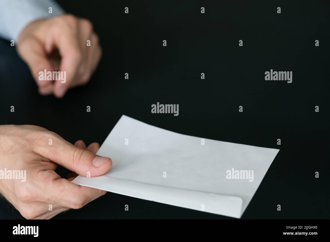 mail delivery service man receiving written notice Stock Photo - Alamy
